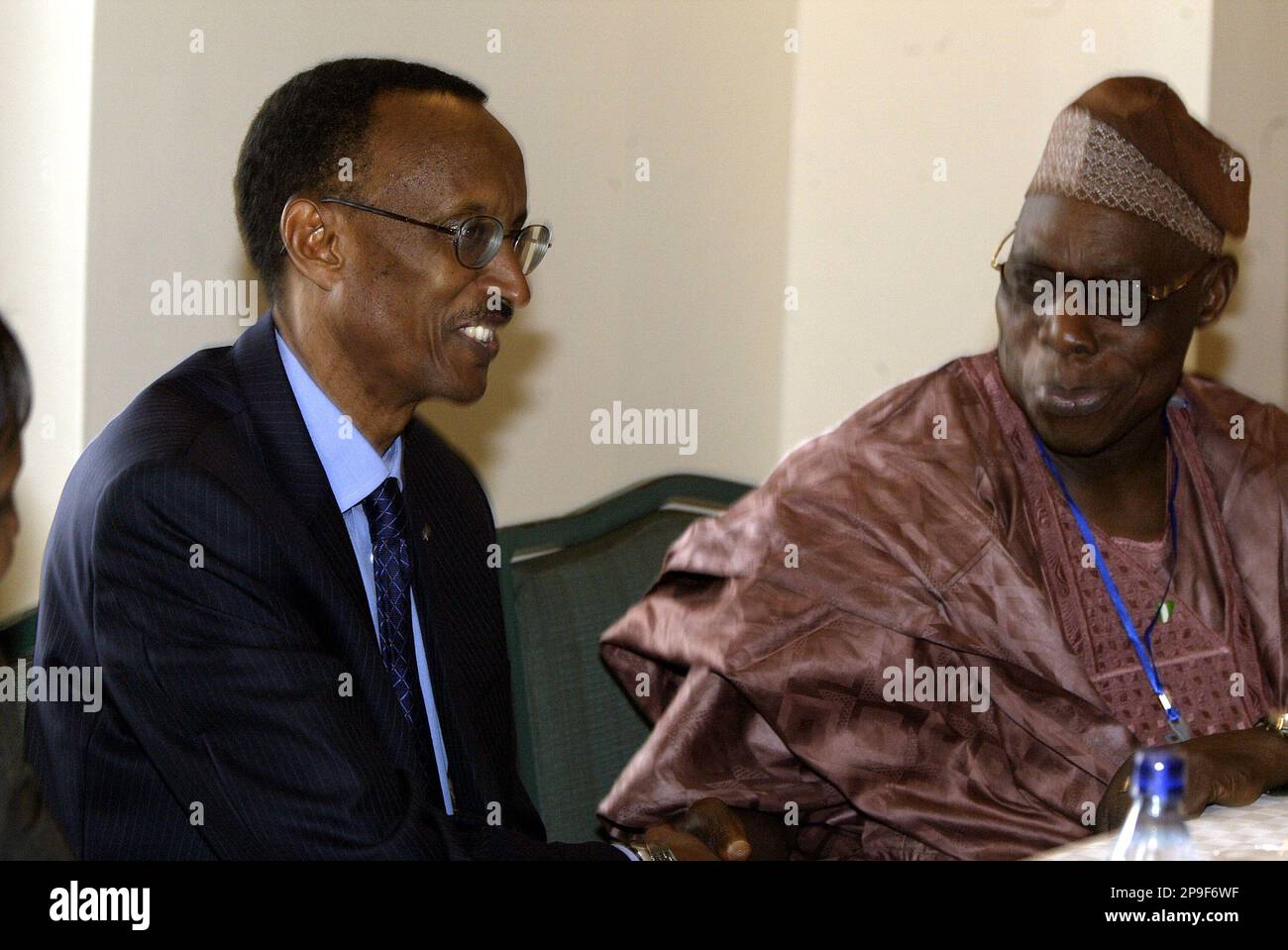 Rwanda's President, Paul Kagame, left, and former Nigerian President, Olusegun Obasanjo, at the ...