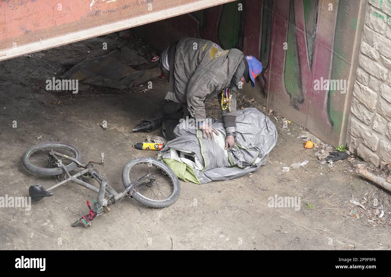 St. Louis, United States. 10th Mar, 2023. A homeless man packs his ...