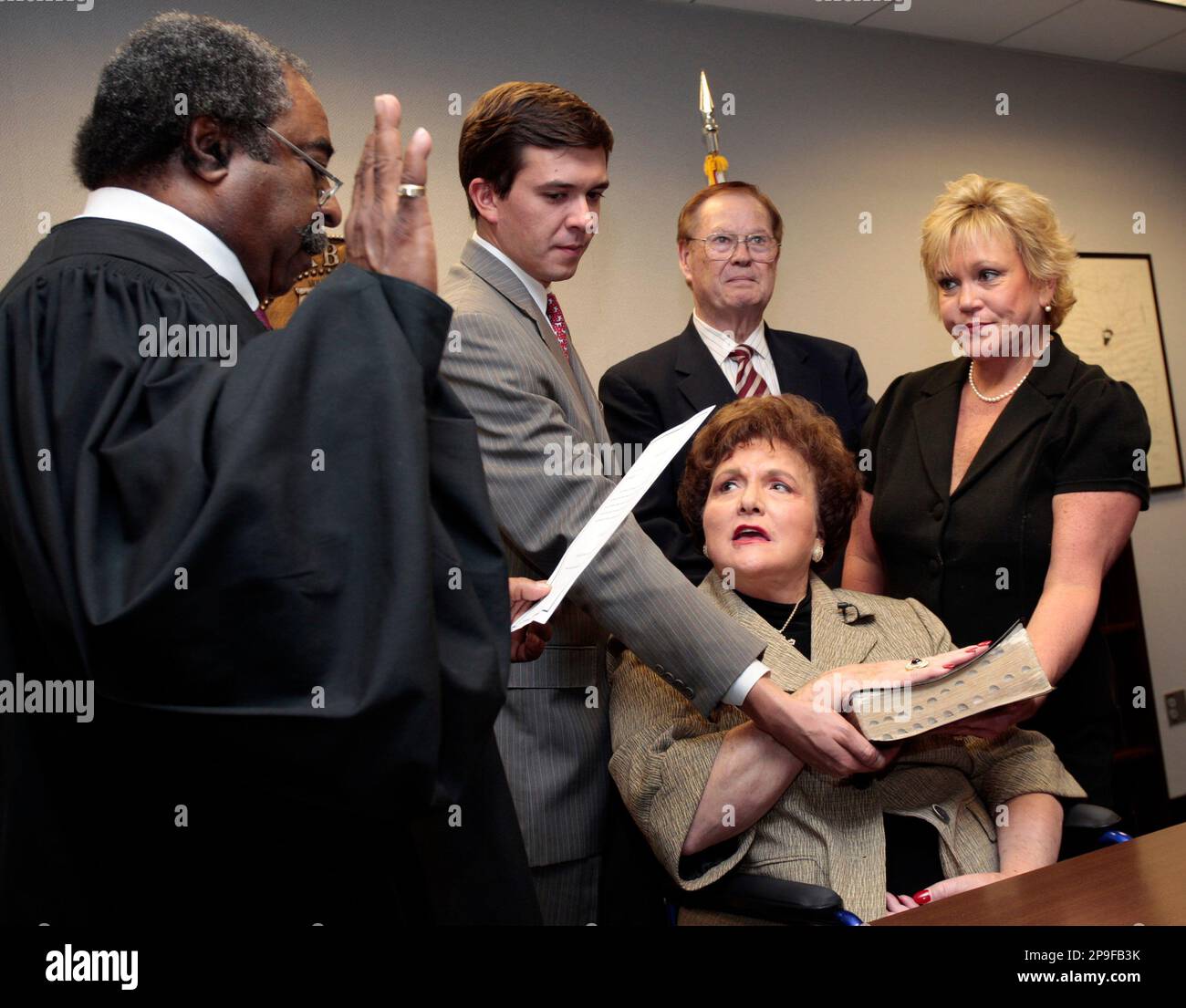 Alabama Public Service Commissioner President Lucy Baxley, front, is ...