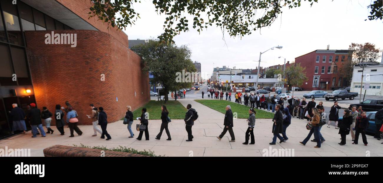 A line of voters wraps around the Waxter Center which is being used as ...