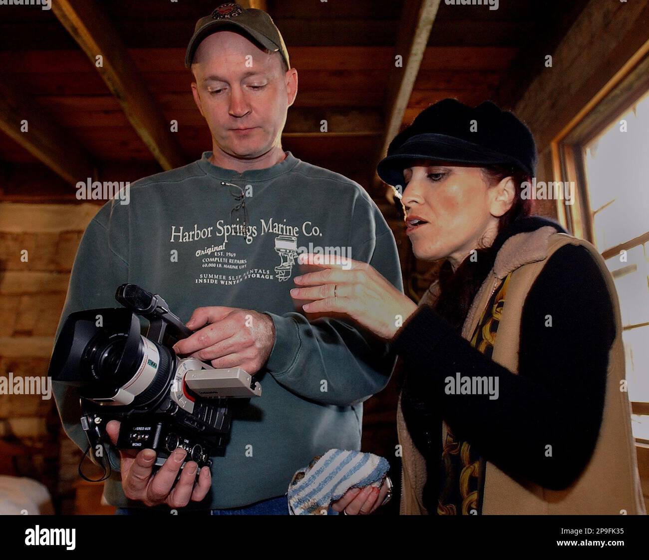 Director Pamela Peak and Steve Oakley look at video shot for the film ...