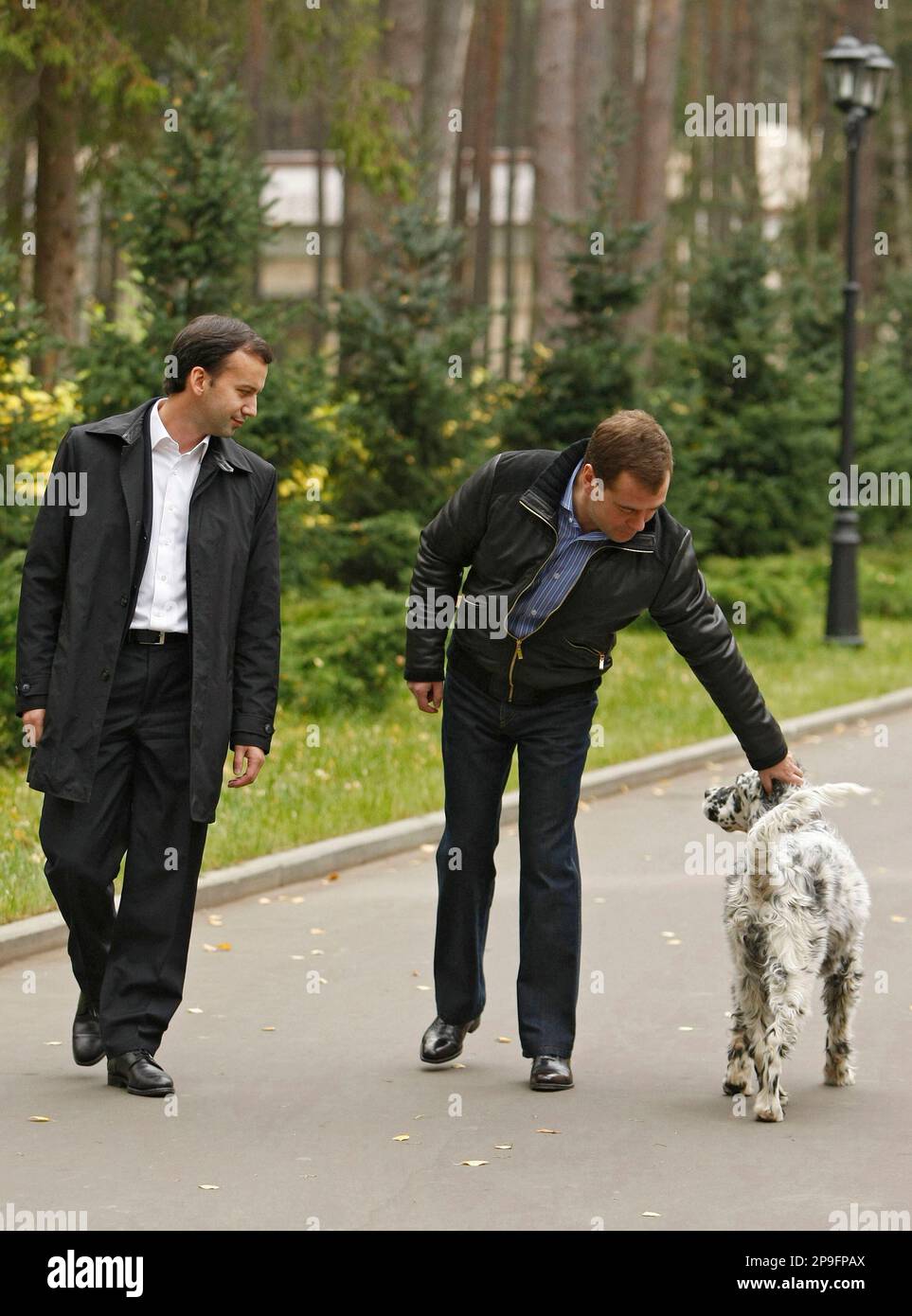 Russian President Dmitry Medvedev and his adviser Arkady Dvorkovich ...