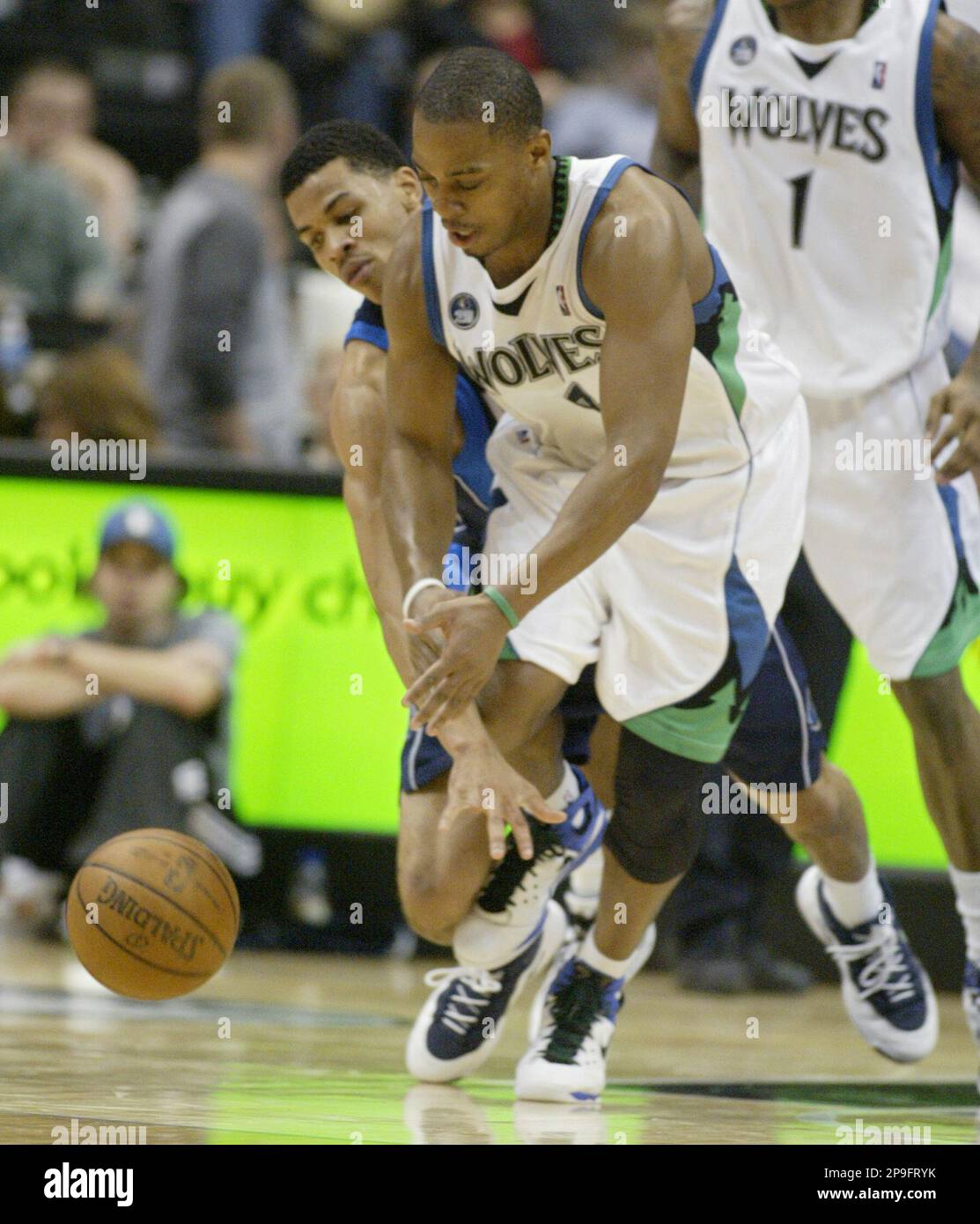 Dallas Mavericks guard Gerald Green, back, battles Minnesota ...