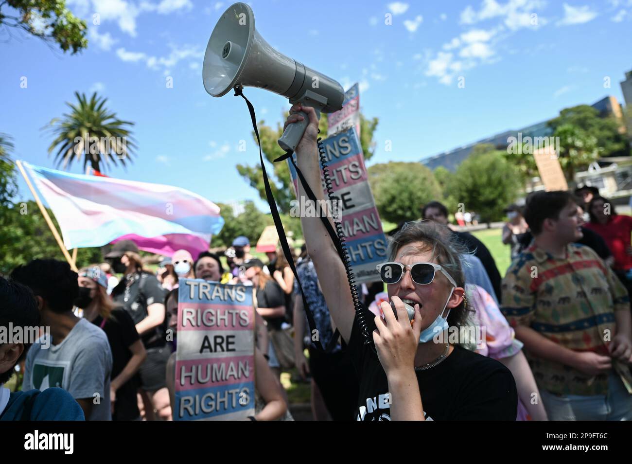 Pro-transgender rights activists protest during a public lecture by ...