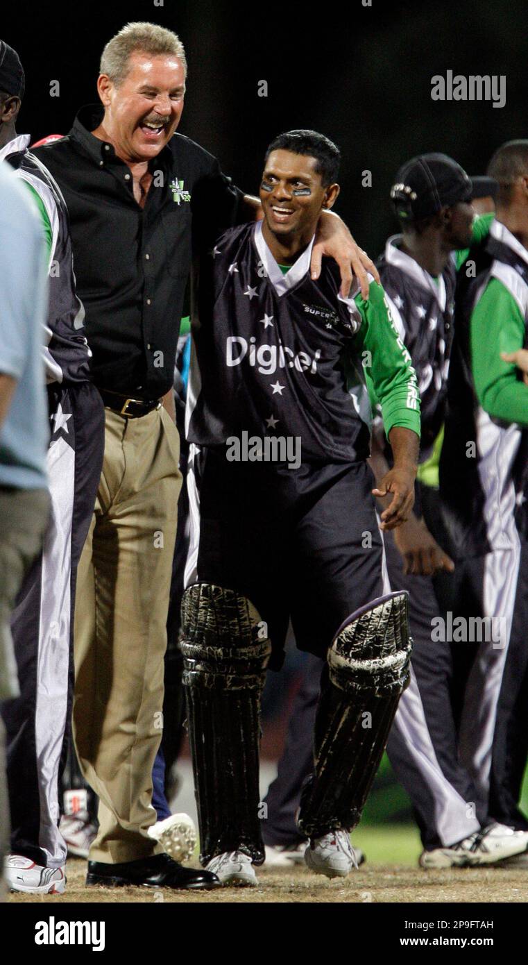 Sir Allen Stanford, left, celebrates with Stanford Superstars' player ...