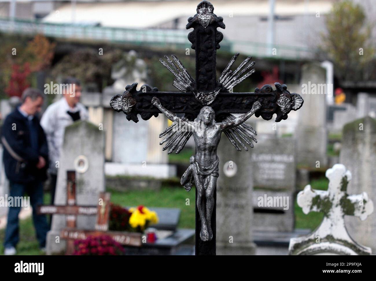 Bosnian Catholics visit graves of their loved ones and lights candles ...