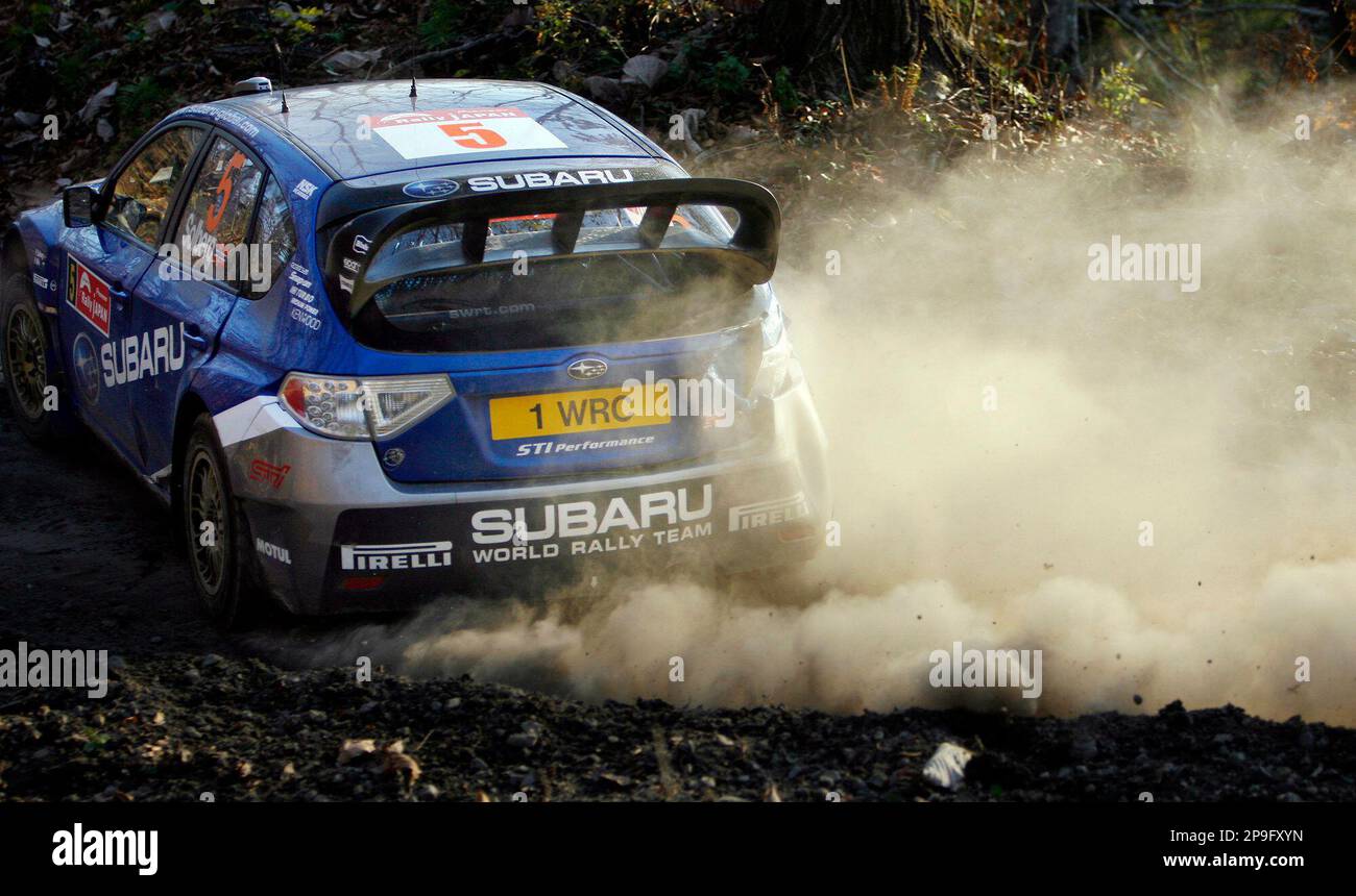 Norway's Petter Solberg of Subaru races in the wood during the Rally ...