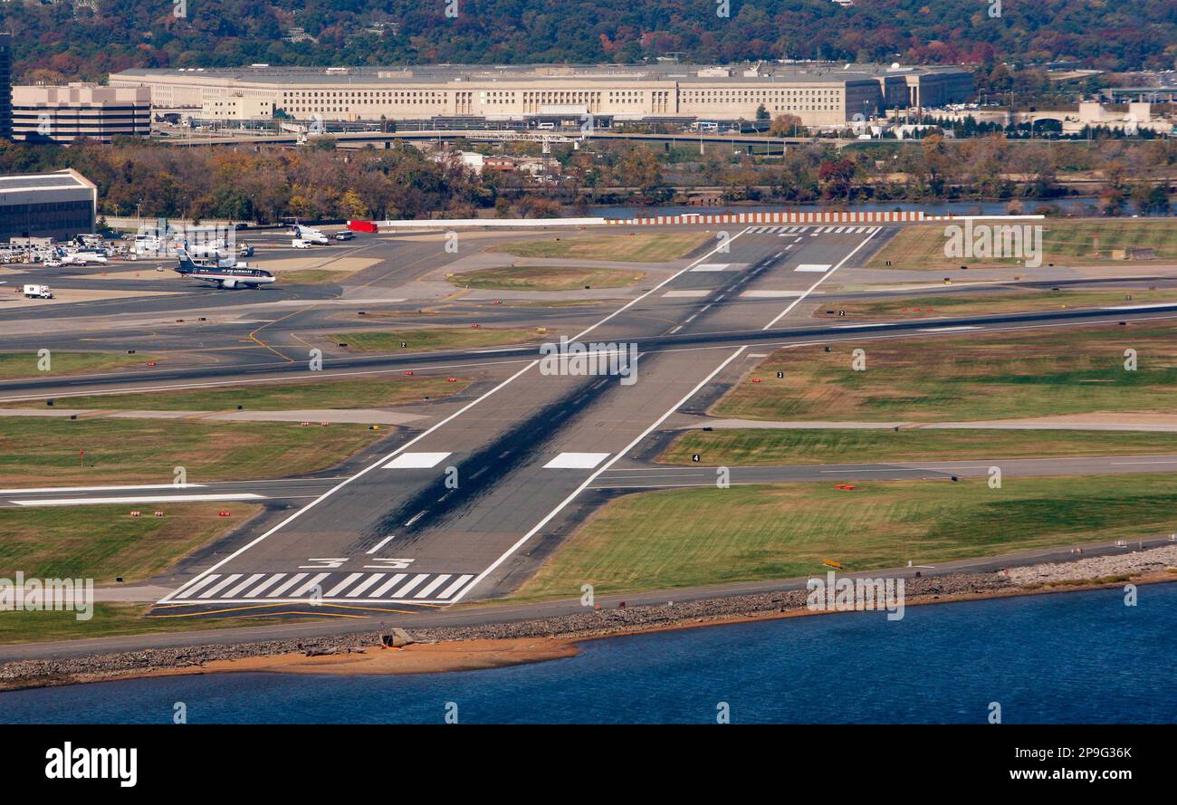 Runway 33 at Reagan National Airport and the Pentagon, rear, can be ...