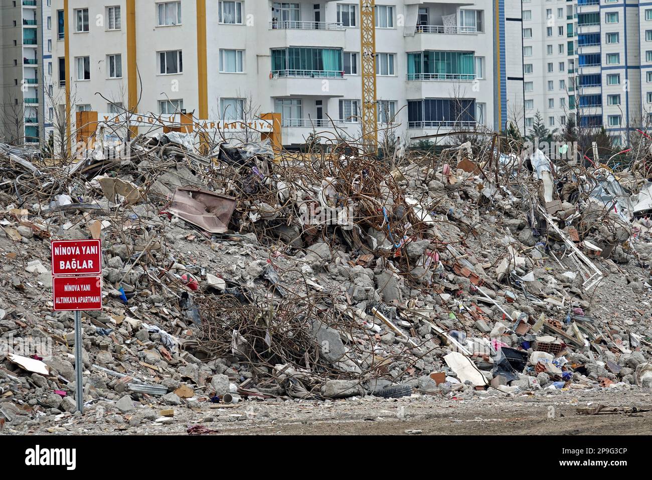The wreckage of collapsed residential buildings is seen in Diyarbakir ...