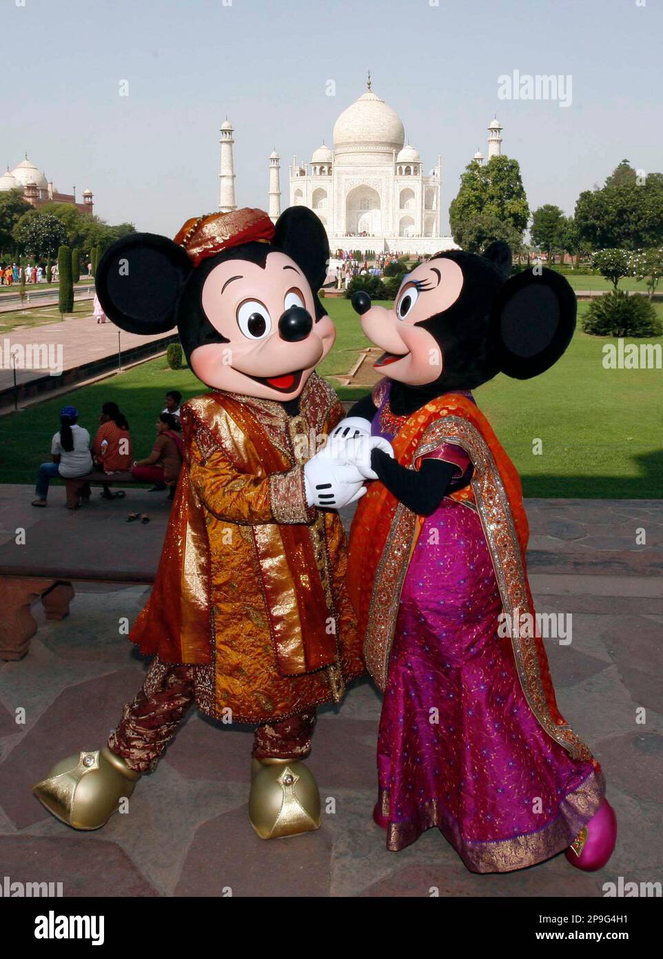 Walt Disney's Mickey Mouse and Minnie Mouse pose at the Taj Mahal in ...
