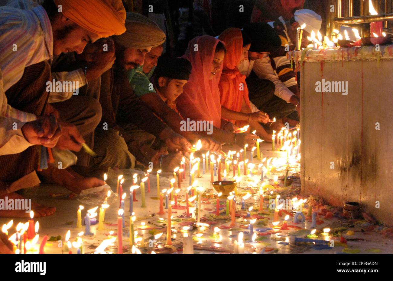 Indian Hindus and Sikhs light candles during the Hindu festival of ...