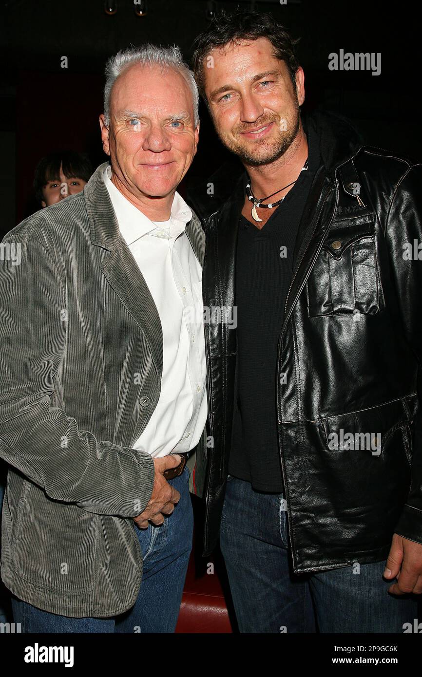 In this photo provided by StarPix, actor Malcolm McDowell, left, poses ...