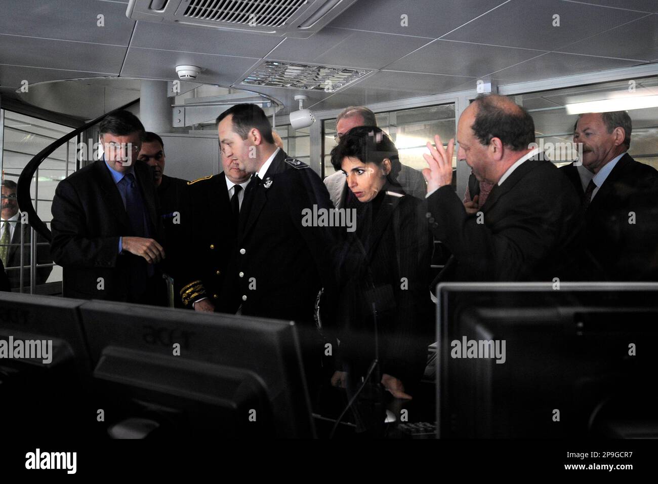 French Justice Minister Rachida Dati, center, is surrounded by ...
