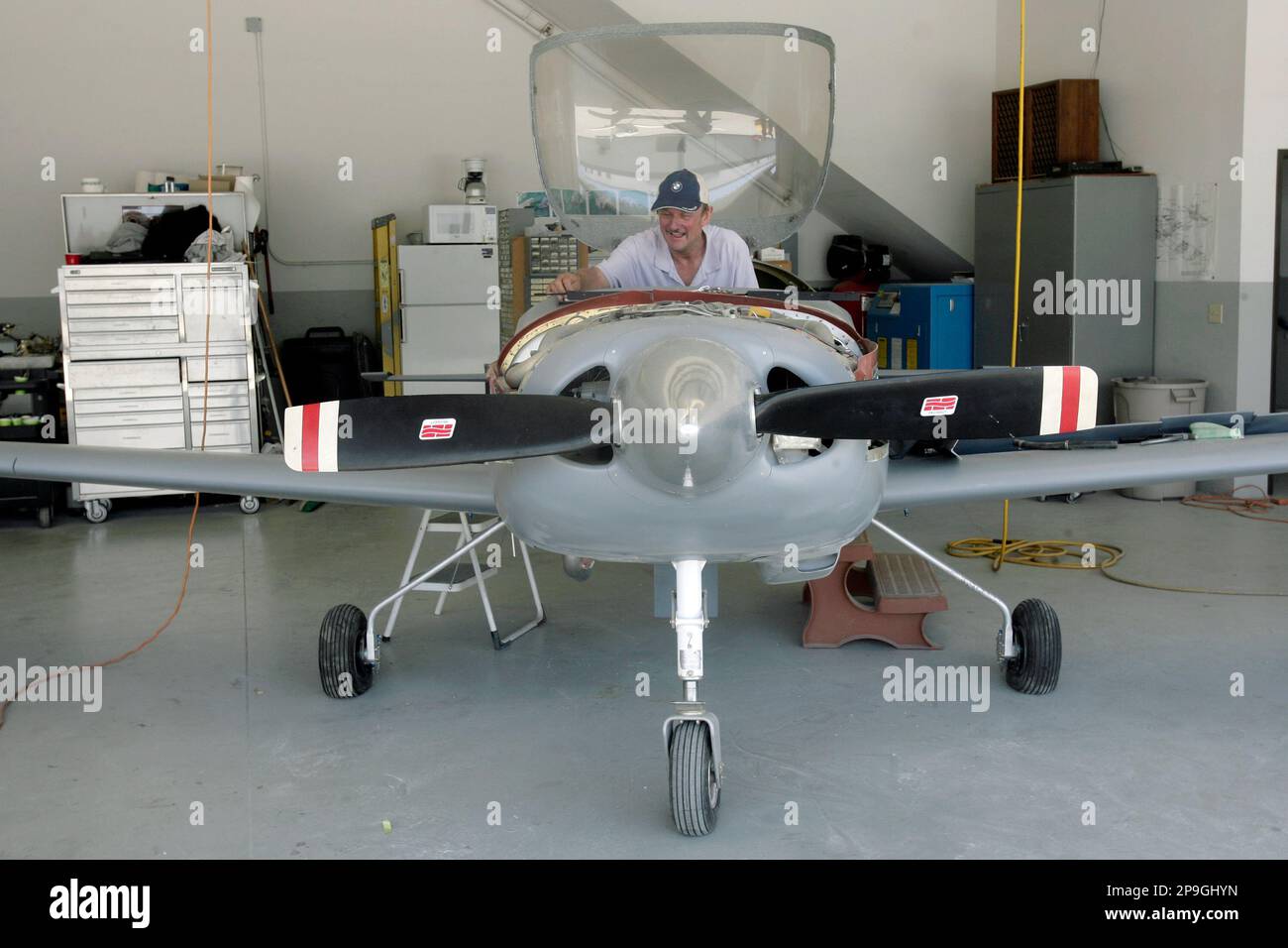 Daniel Gray works on building a Questair Venture airplane inside his ...