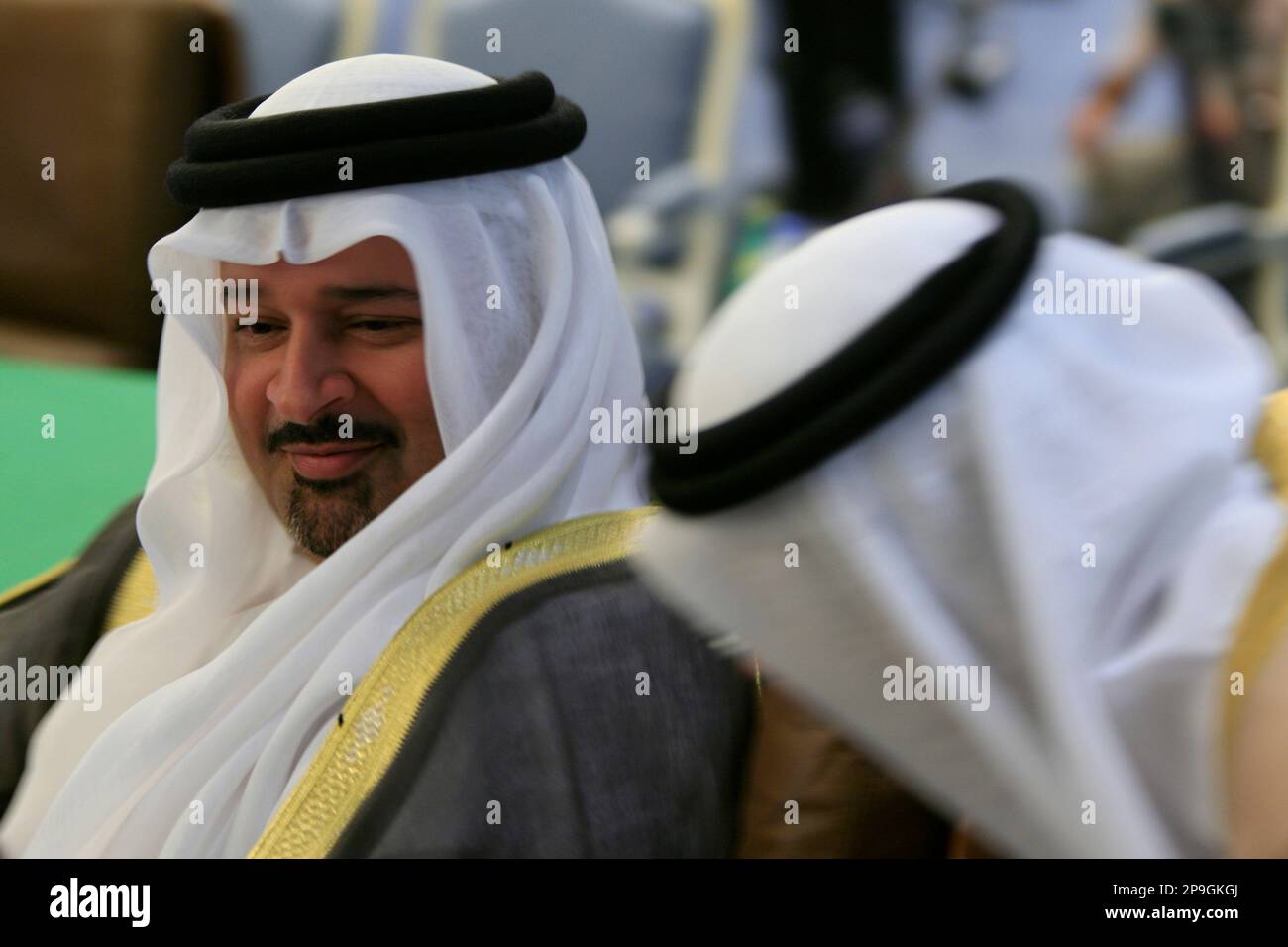 Bahrain's Finance Minster Ahmad bin Khalifa, left, attends the meeting ...