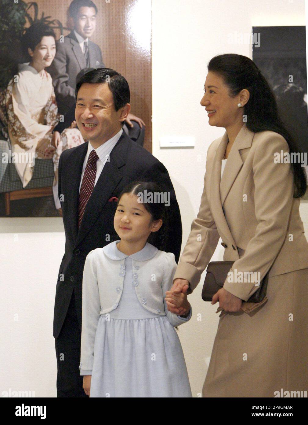 Japan's Crown Prince Naruhito, left, Crown Princess Masako, right, and ...