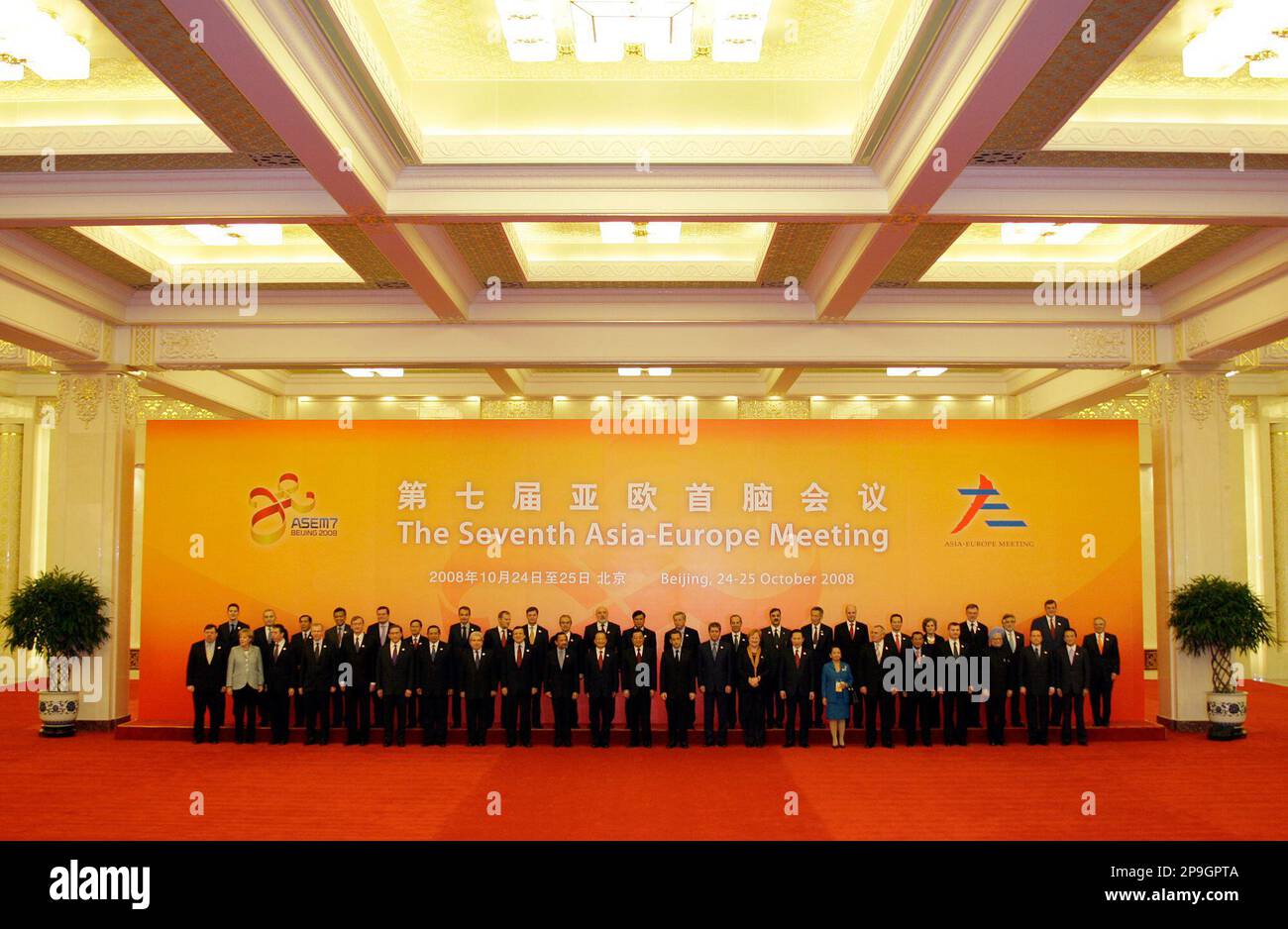 Members representing Asian and European countries pose for a Family ...