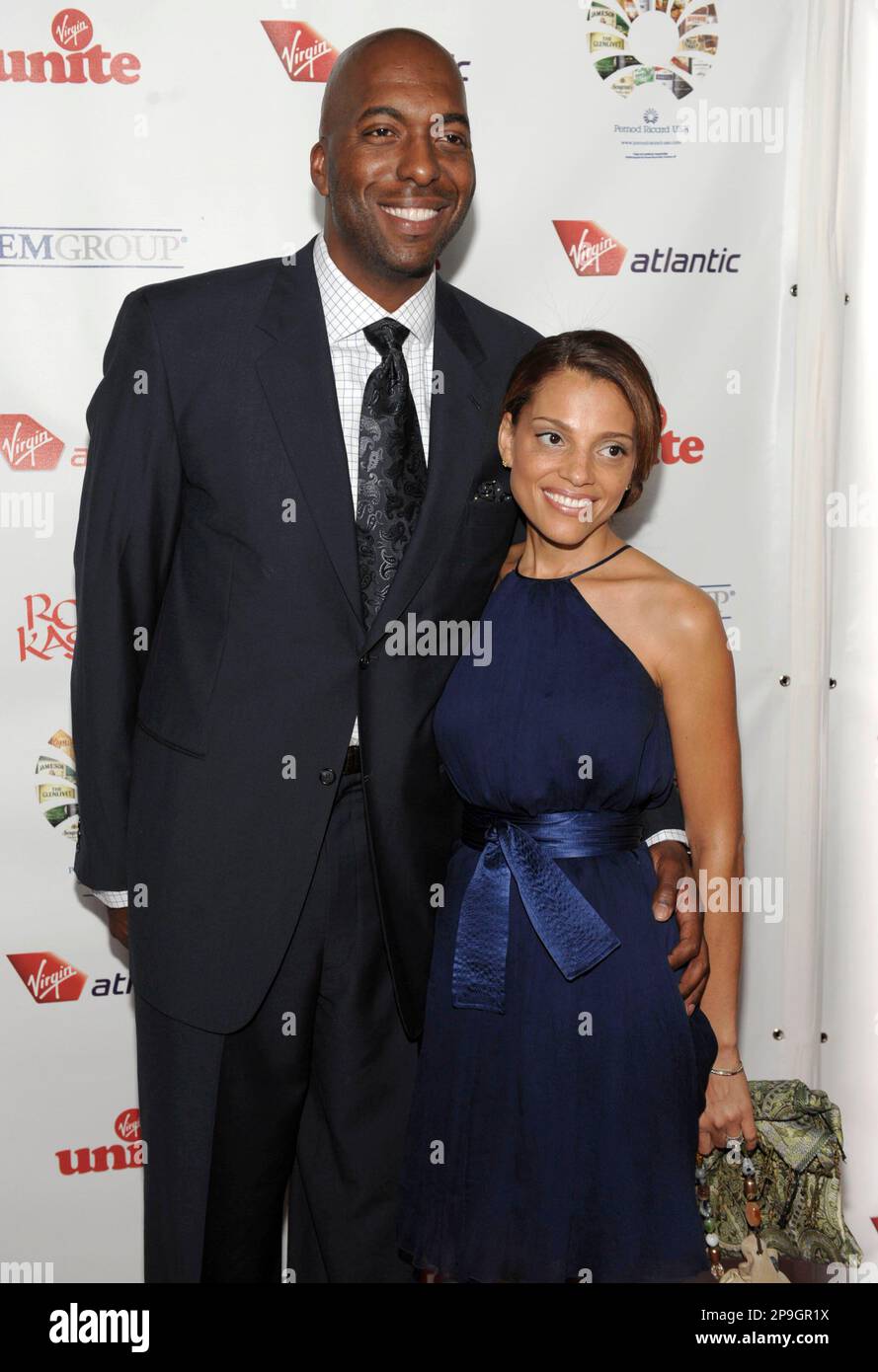 John Salley , left, and wife Natasha arrive at the Virgin Unite Rock ...