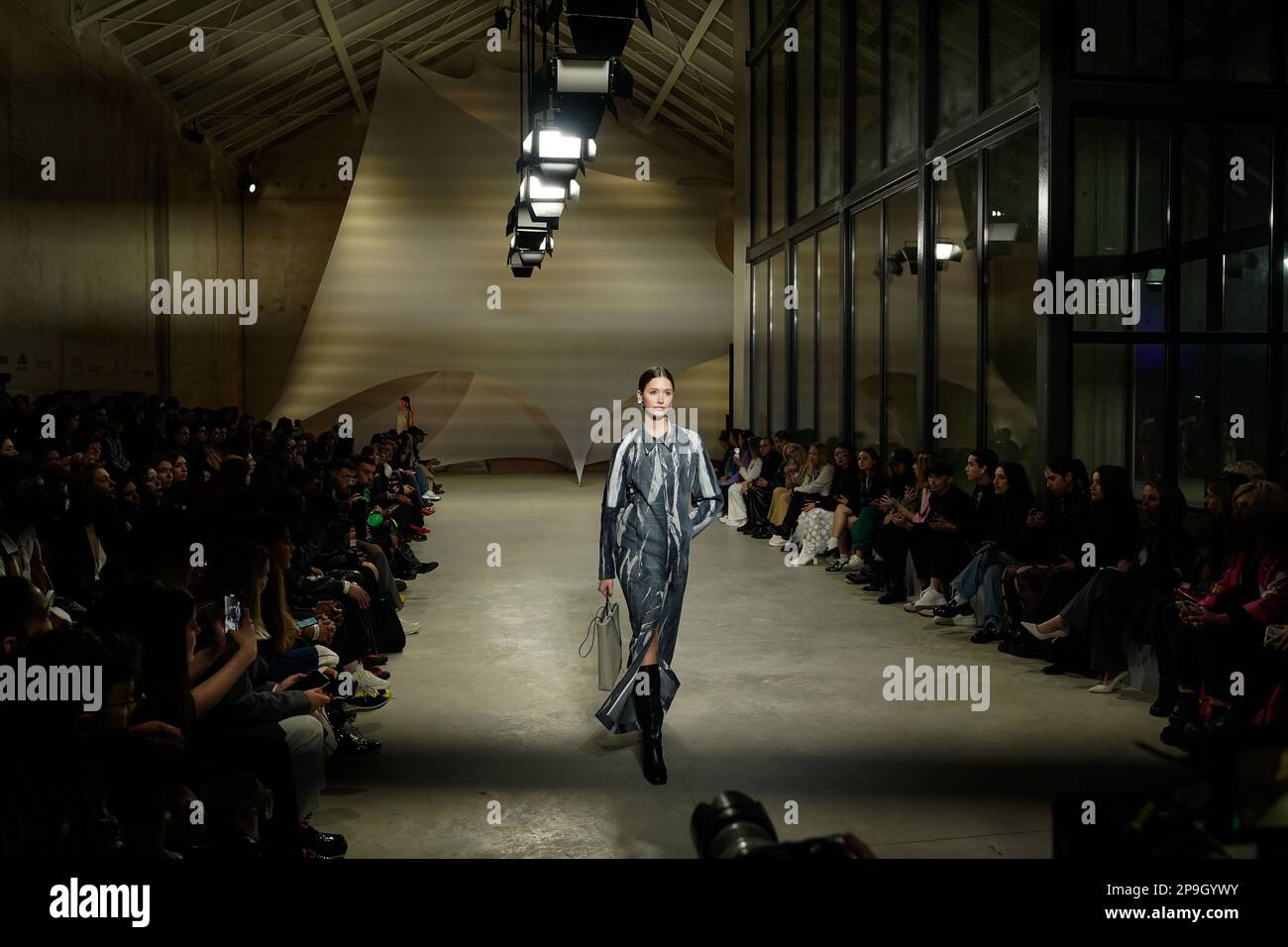 Lisbon, Portugal. 10th Mar, 2023. A model walks the runway during ...