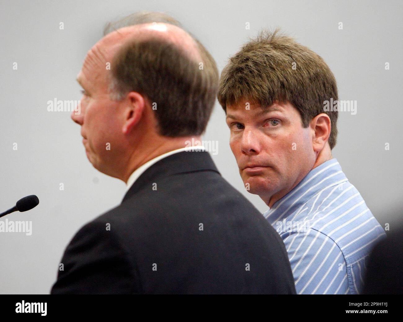 Craig Miller, right, standing with his attorney Mark Ethington before ...