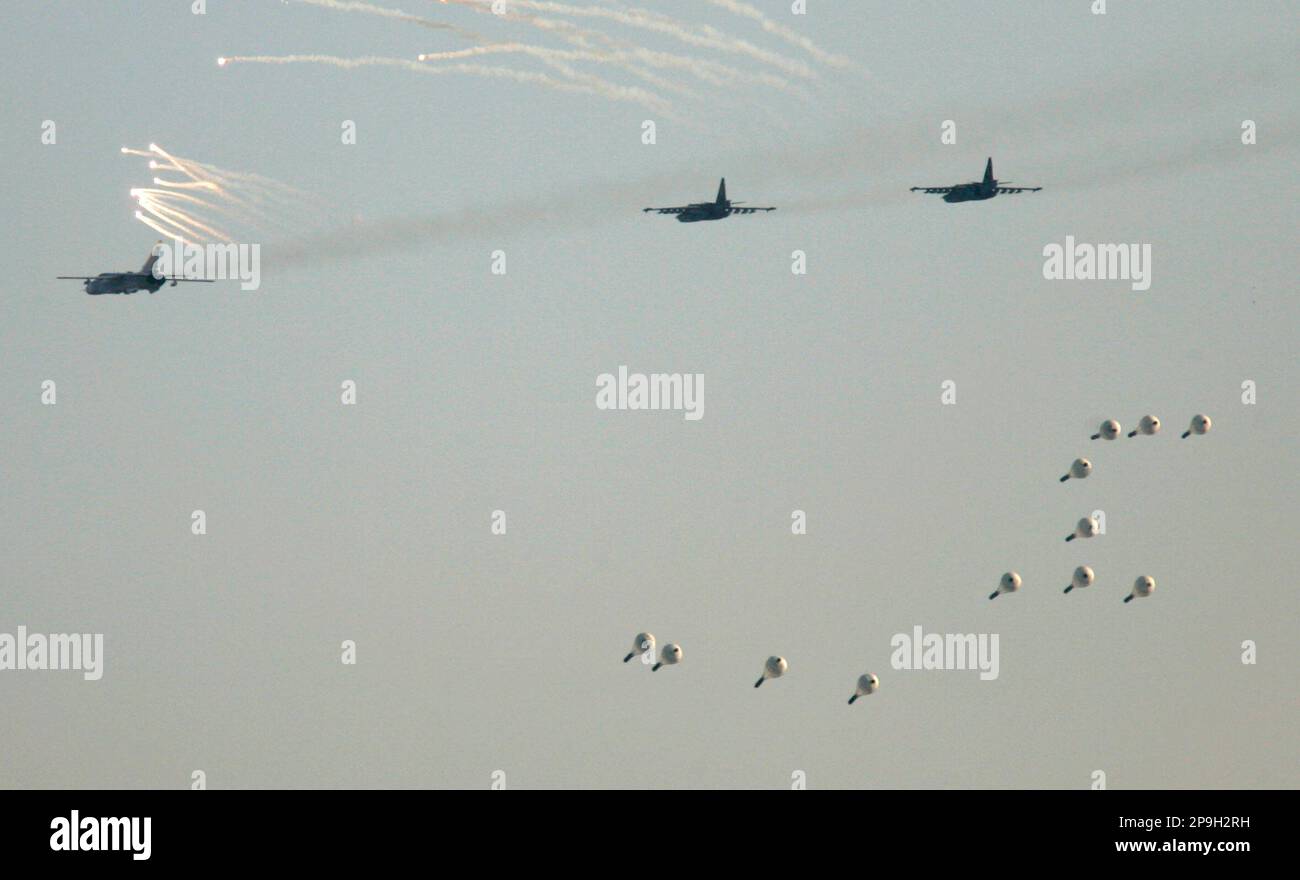Russian army Sukhoi Su-25 jets, drops bombs as they take part in a ...