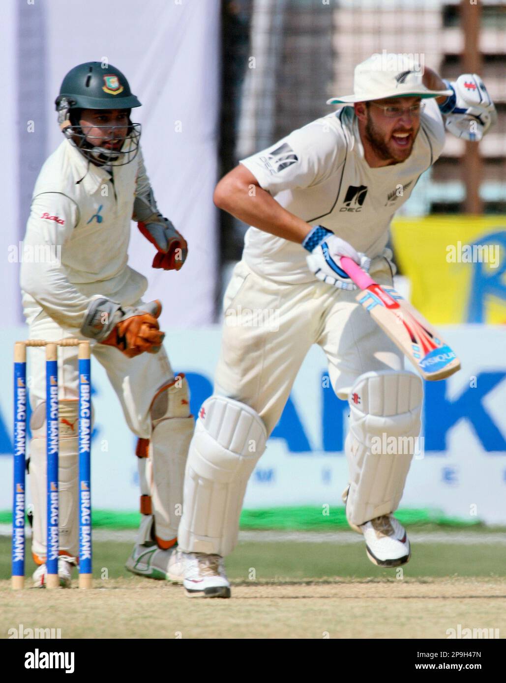 New Zealand's captain Daniel Vettori, takes a run as Bangladesh's ...