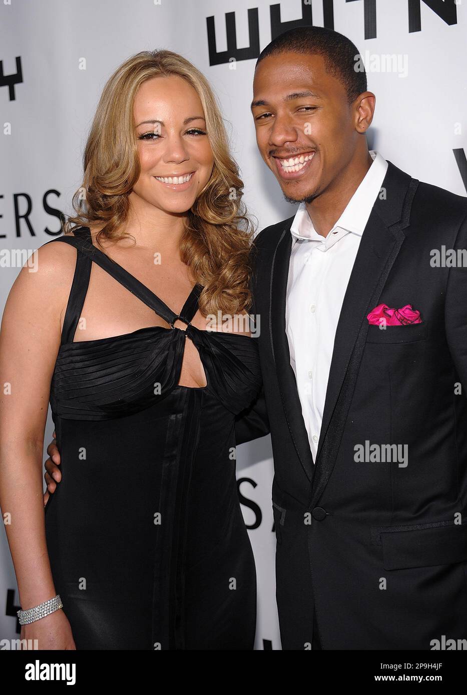 Singer Mariah Carey and husband actor Nick Cannon attend the Whitney ...