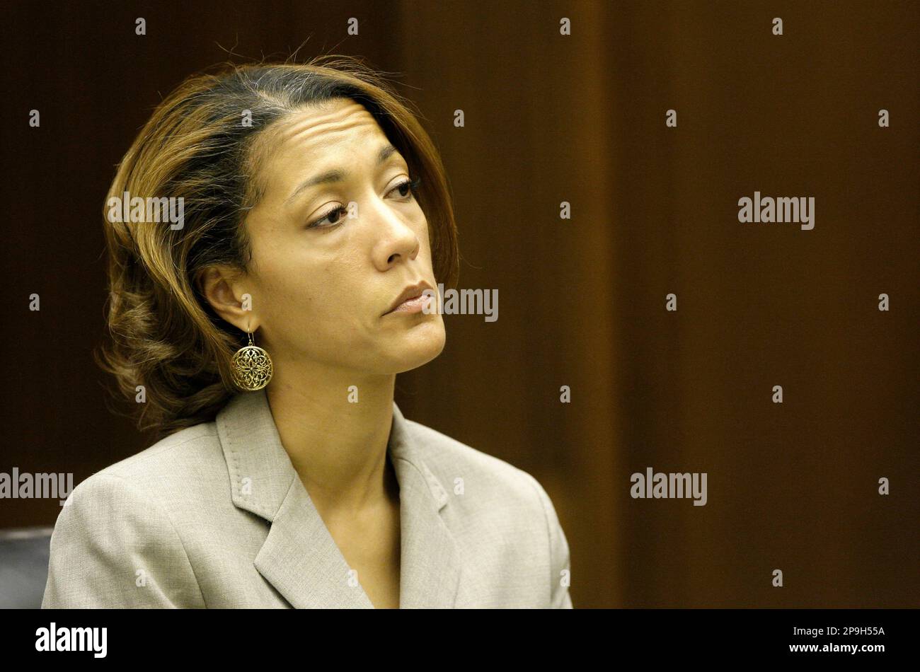 Christine Beatty listens as Wayne County Circuit Judge Timothy Kenny ...