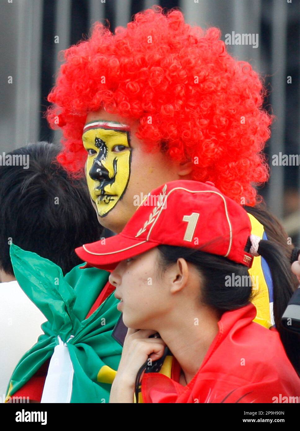 Ferrari fans on the stands watch the Chinese Formula One Grand Prix at ...