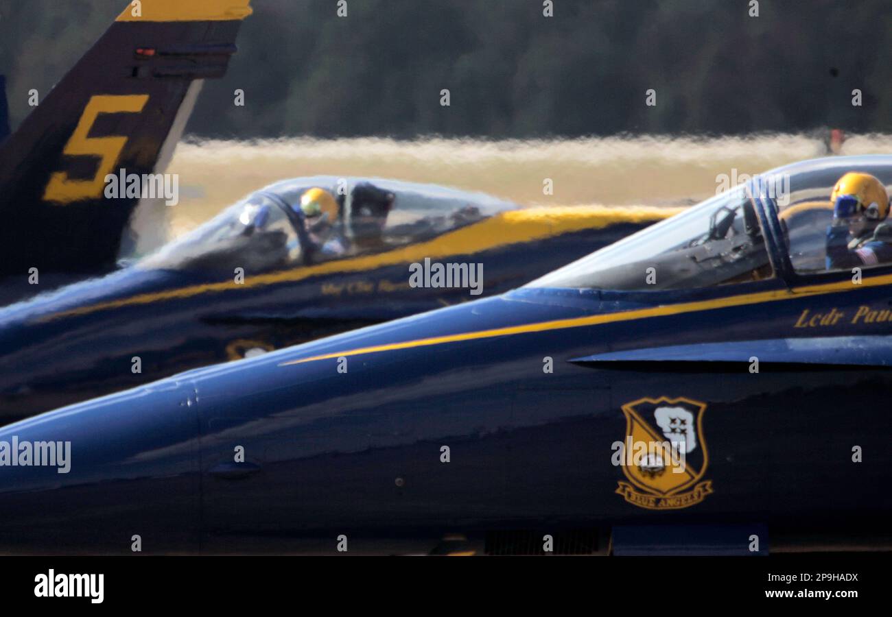 Members of the U.S. Navy Blue Angels taxi through heat waves at Little ...
