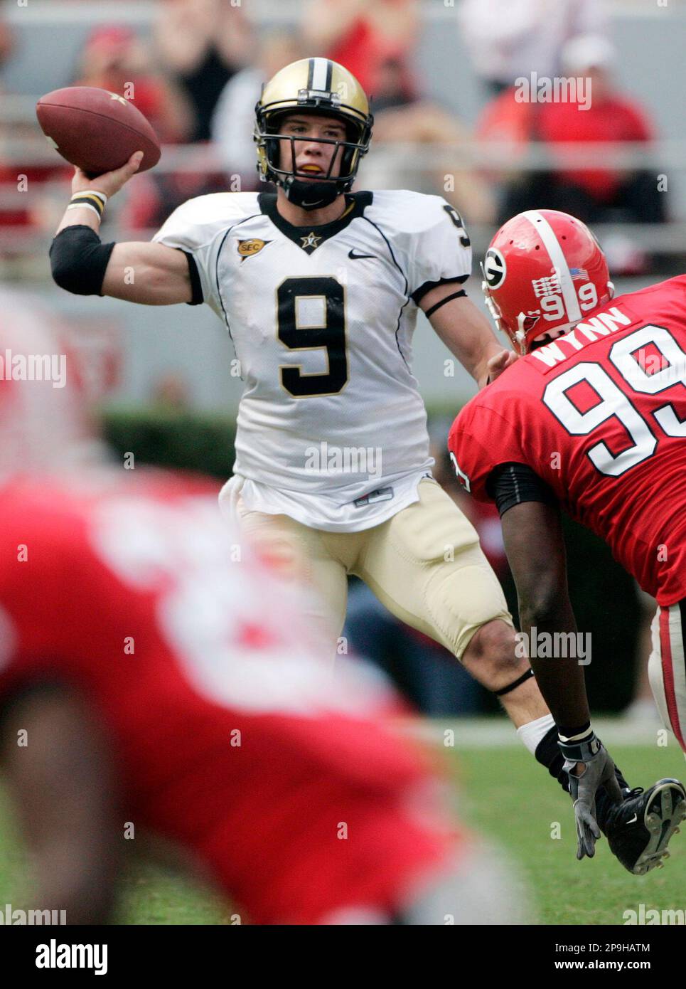 Vanderbilt quarterback Mackenzi Adams throws under persure from Georgia ...