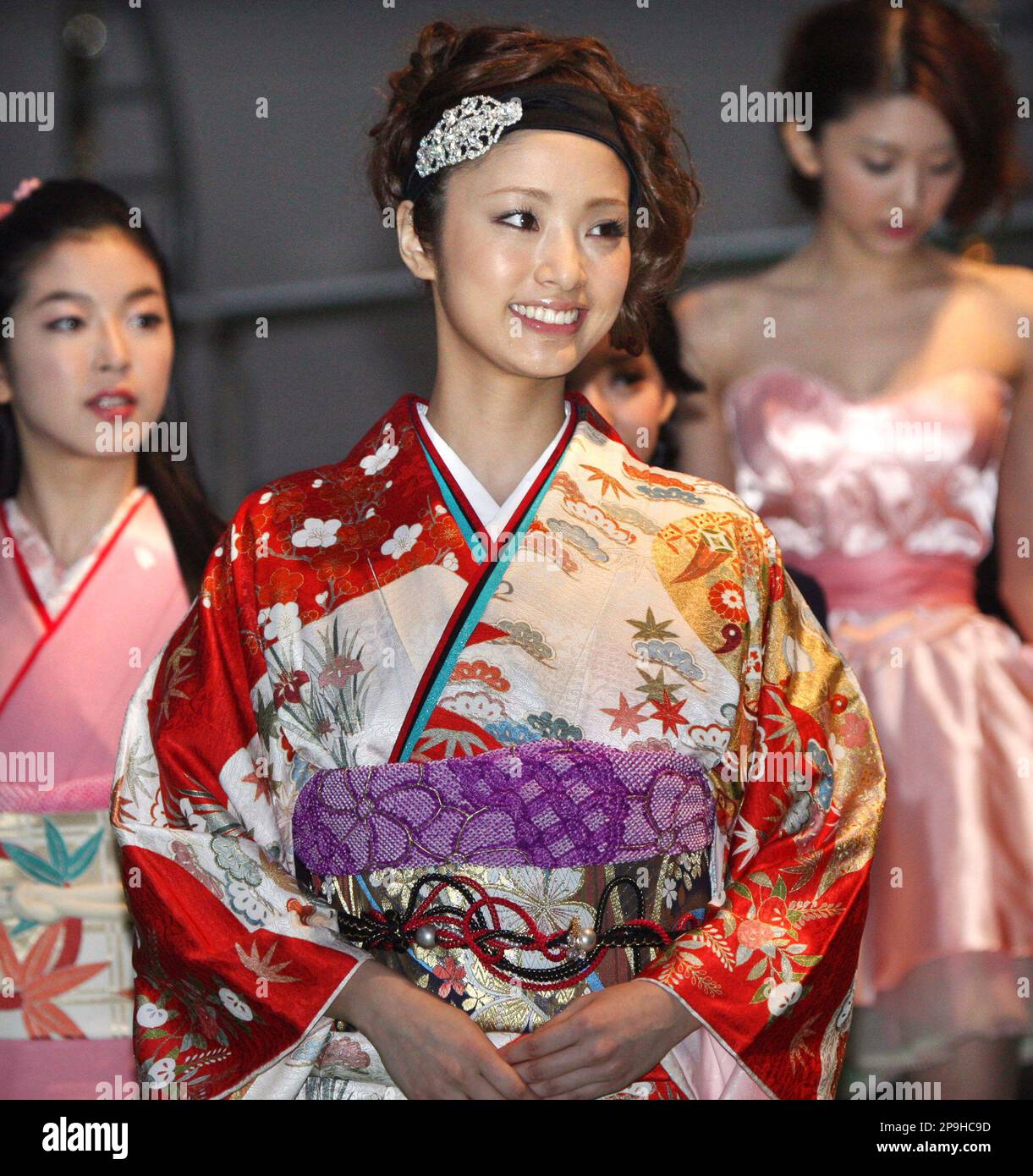 Japanese actress Aya Ueto smiles as she arrives for the opening event ...