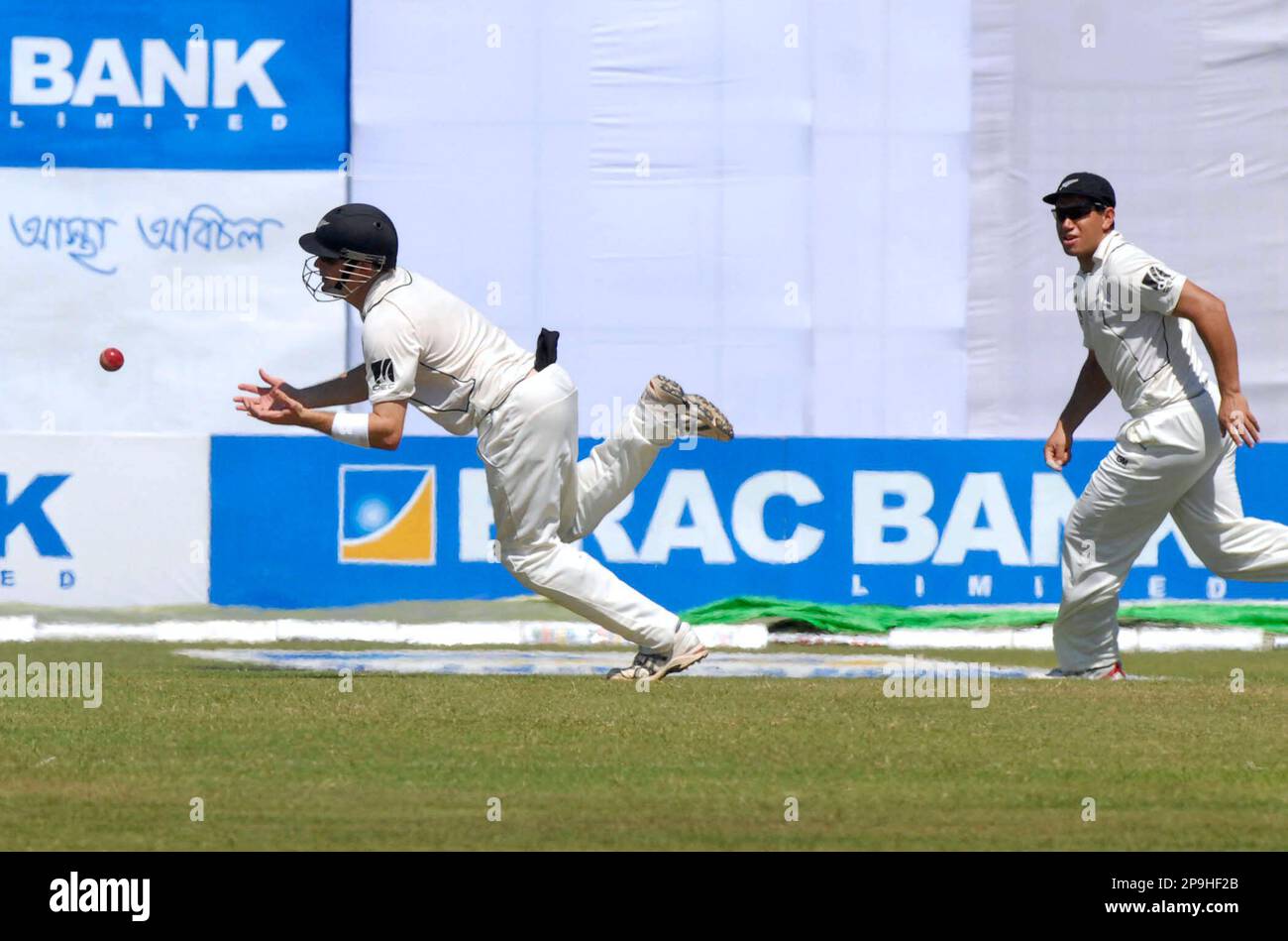 New Zealand's cricketer Jamie How misses a catch of Bangladesh's ...
