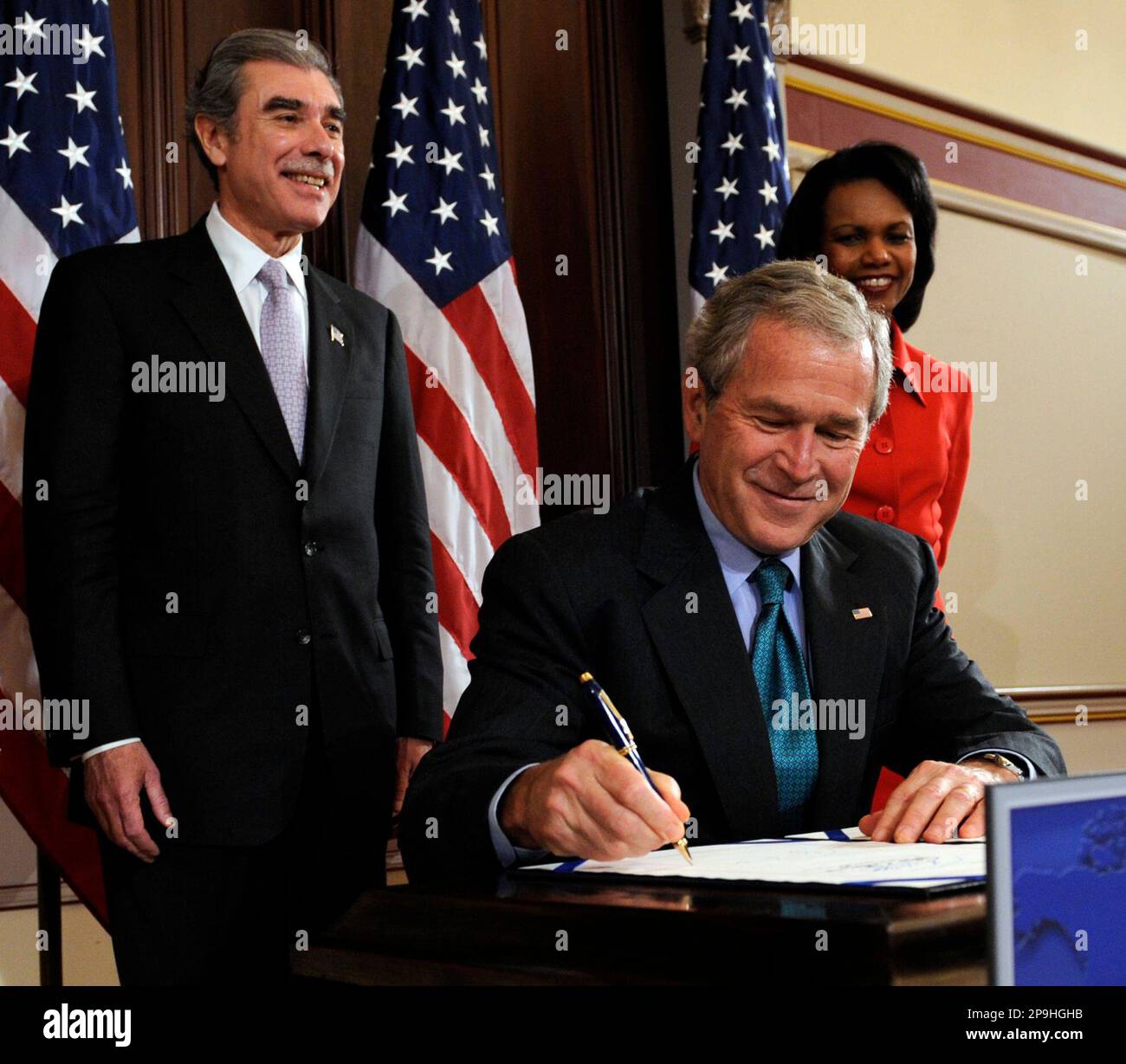 President Bush signs the Andean Trade Preference Act Extension in the ...