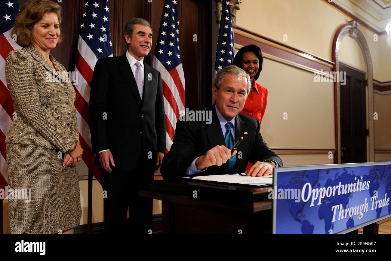 President Bush signs the Andean Trade Preference Act Extension in the ...