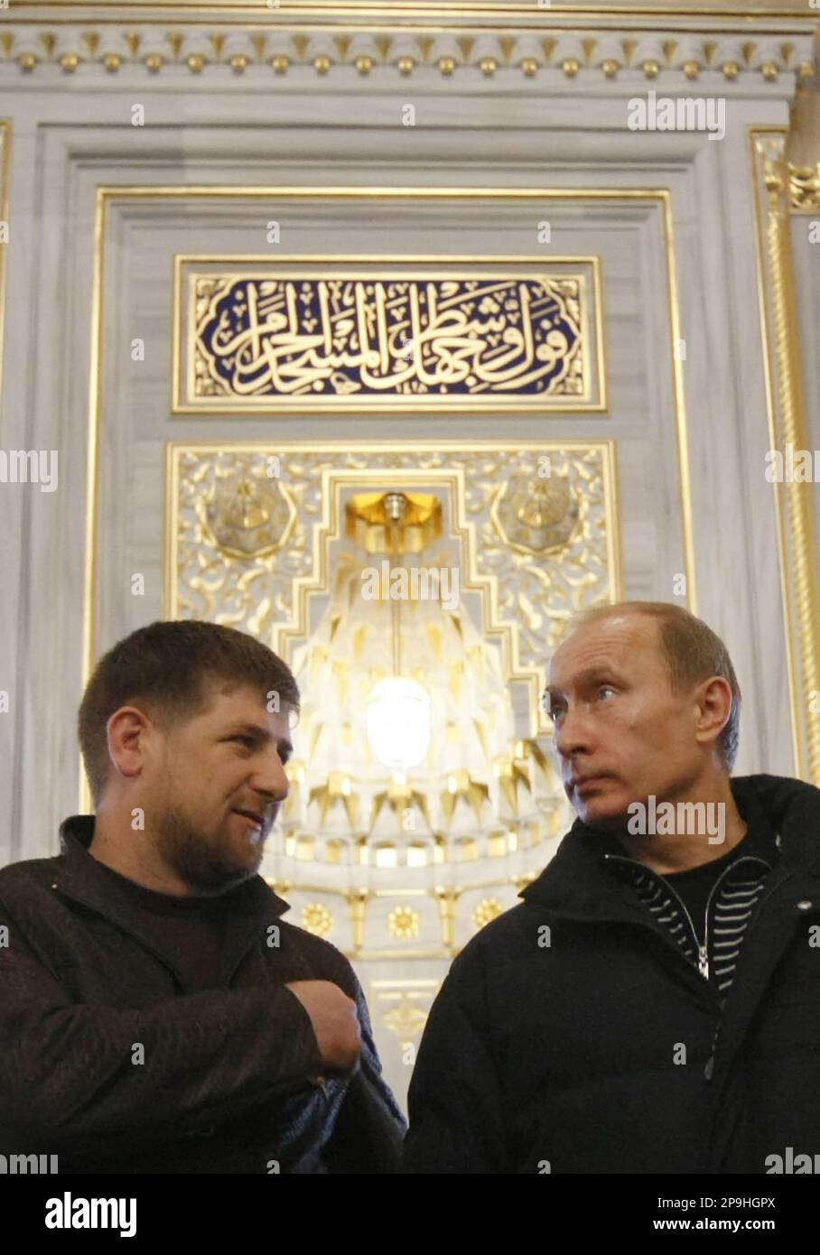 Russian Prime Minister Vladimir Putin, right, and Chechen regional ...