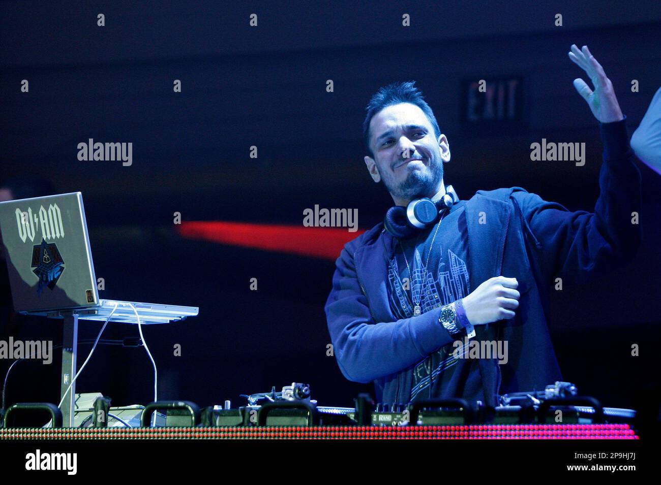 DJ-AM aka Adam Goldstein gestures while performing with rapper Jay-Z ...