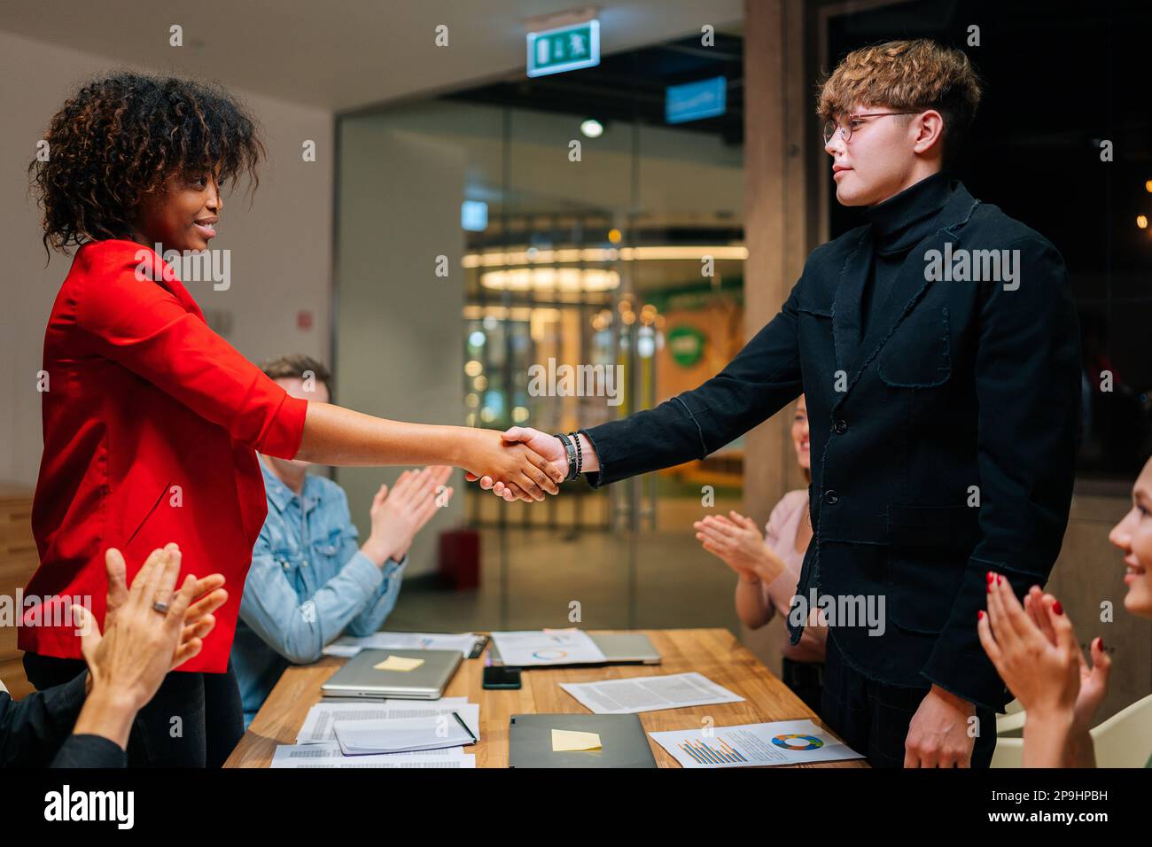 Side view of African American businesswoman and Caucasian businessman ...