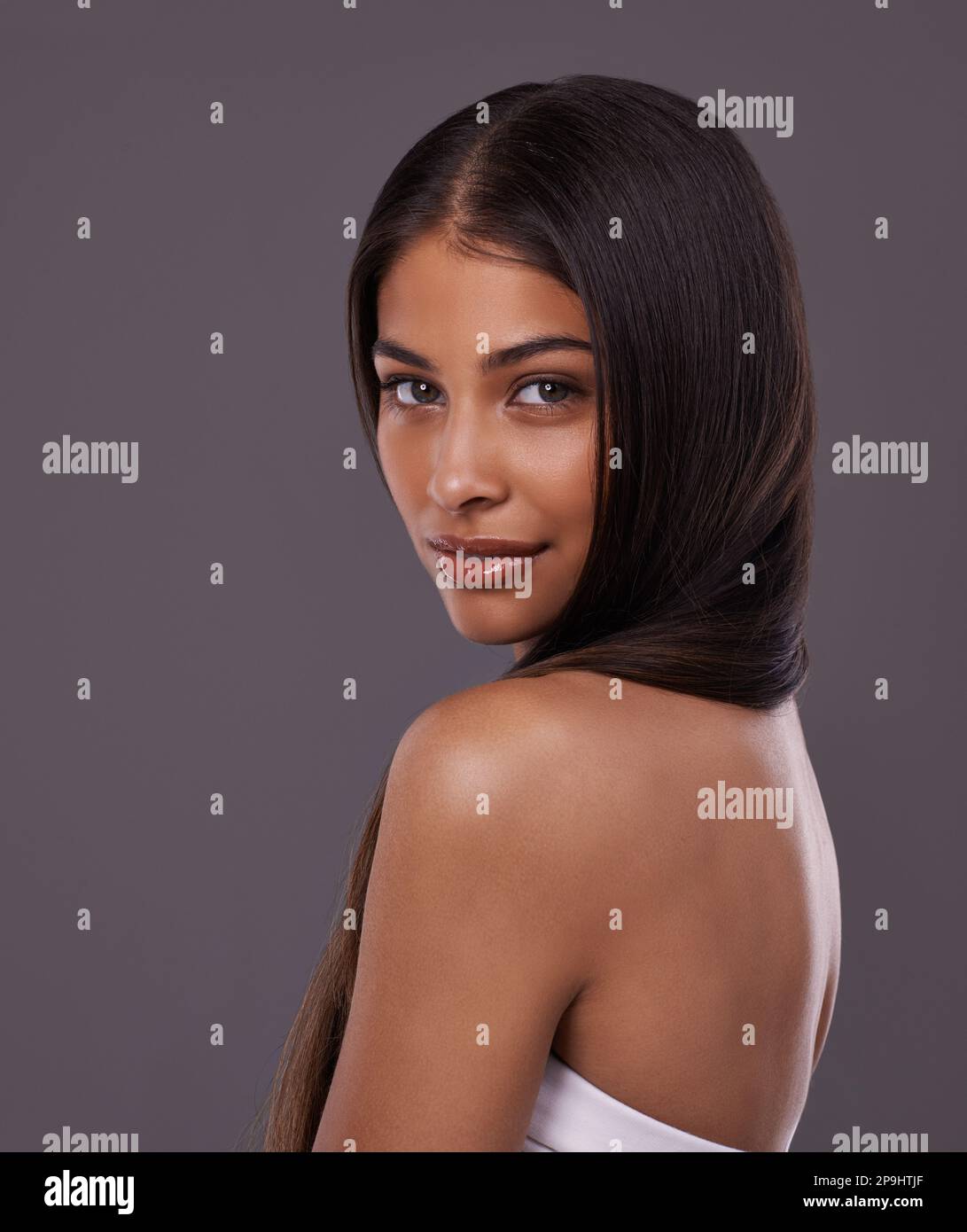 Perfect poise and real beauty. Portrait of a beautiful young woman ...