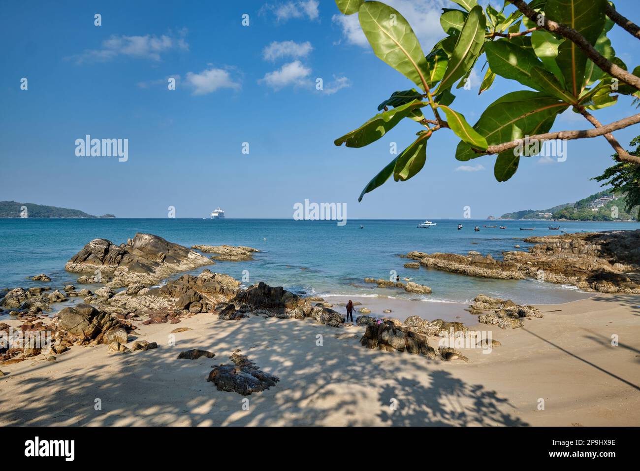 The rock-strewn shore at Kalim Bay (Kalim Beach), at the north end of ...
