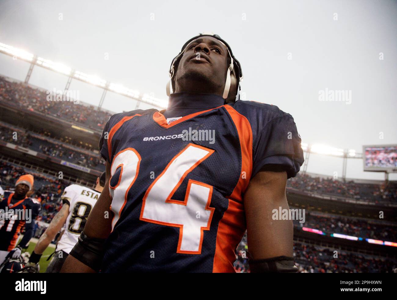 Denver Broncos defensive end Jarvis Moss walks off the field after a 24 ...