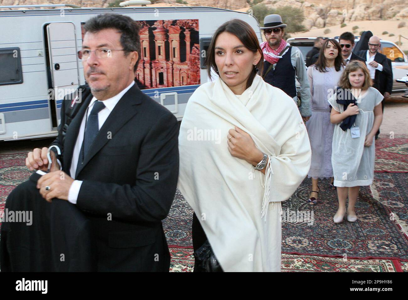 Italian singer Laura Pausini, center, and Italian Hip Hop singer ...