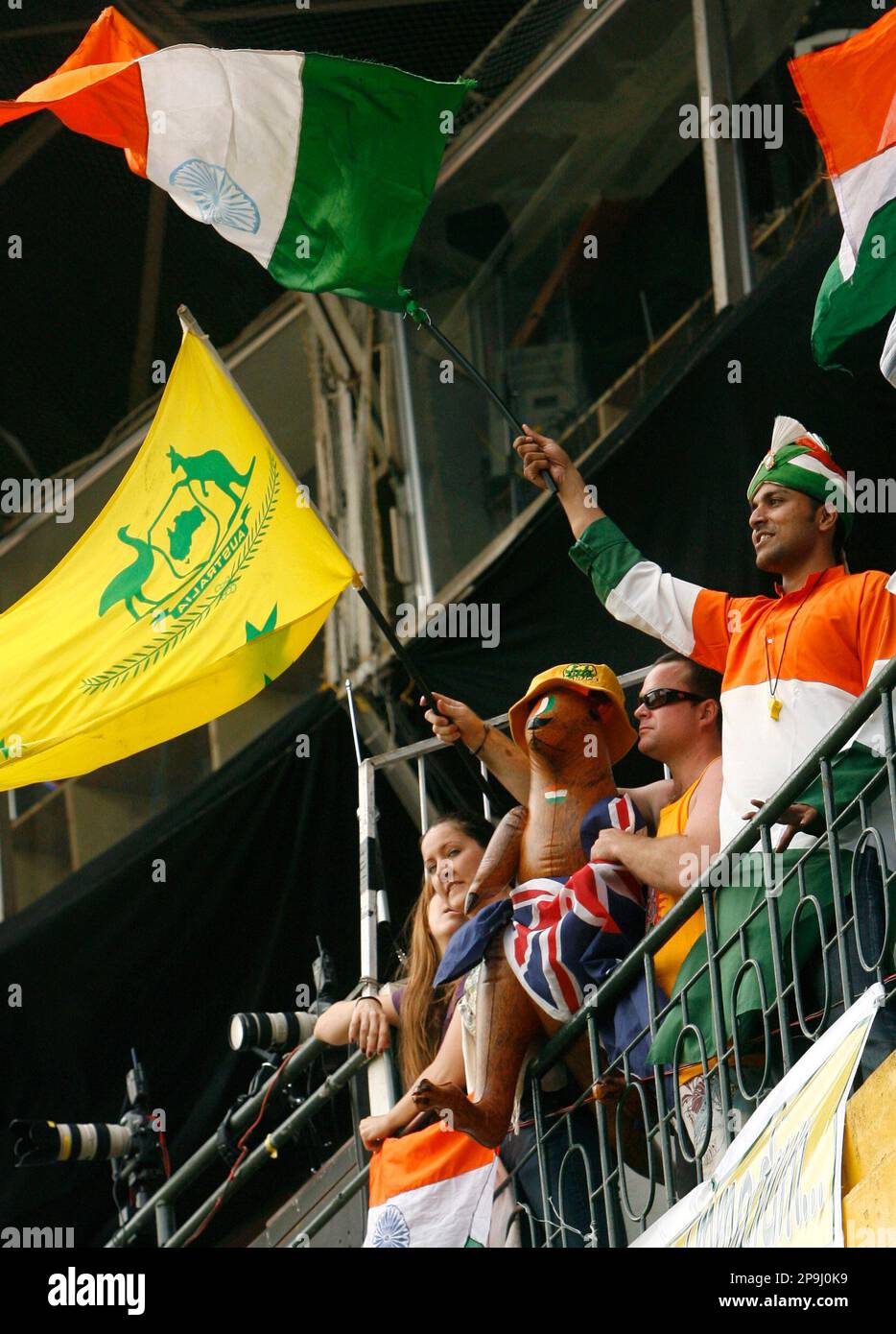 Australian and Indian cricket team supporters cheer on the fourth day ...