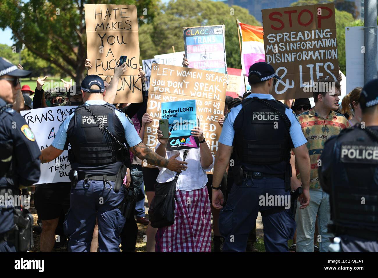 Pro-transgender rights activists protest during a public lecture by ...