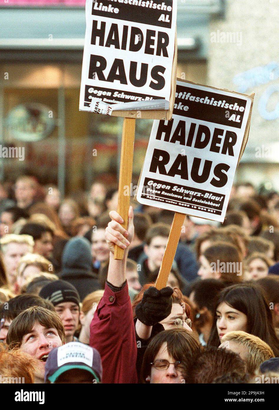 ** FILE ** In this Feb. 18, 2000 file picture, protesters hold up a ...