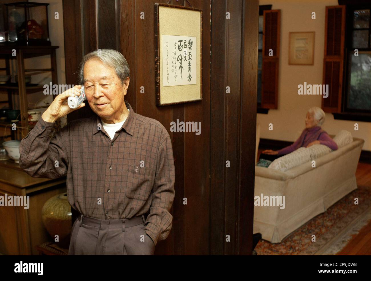 University of Chicago Physics professor Yoichiro Nambu, left, talks on ...