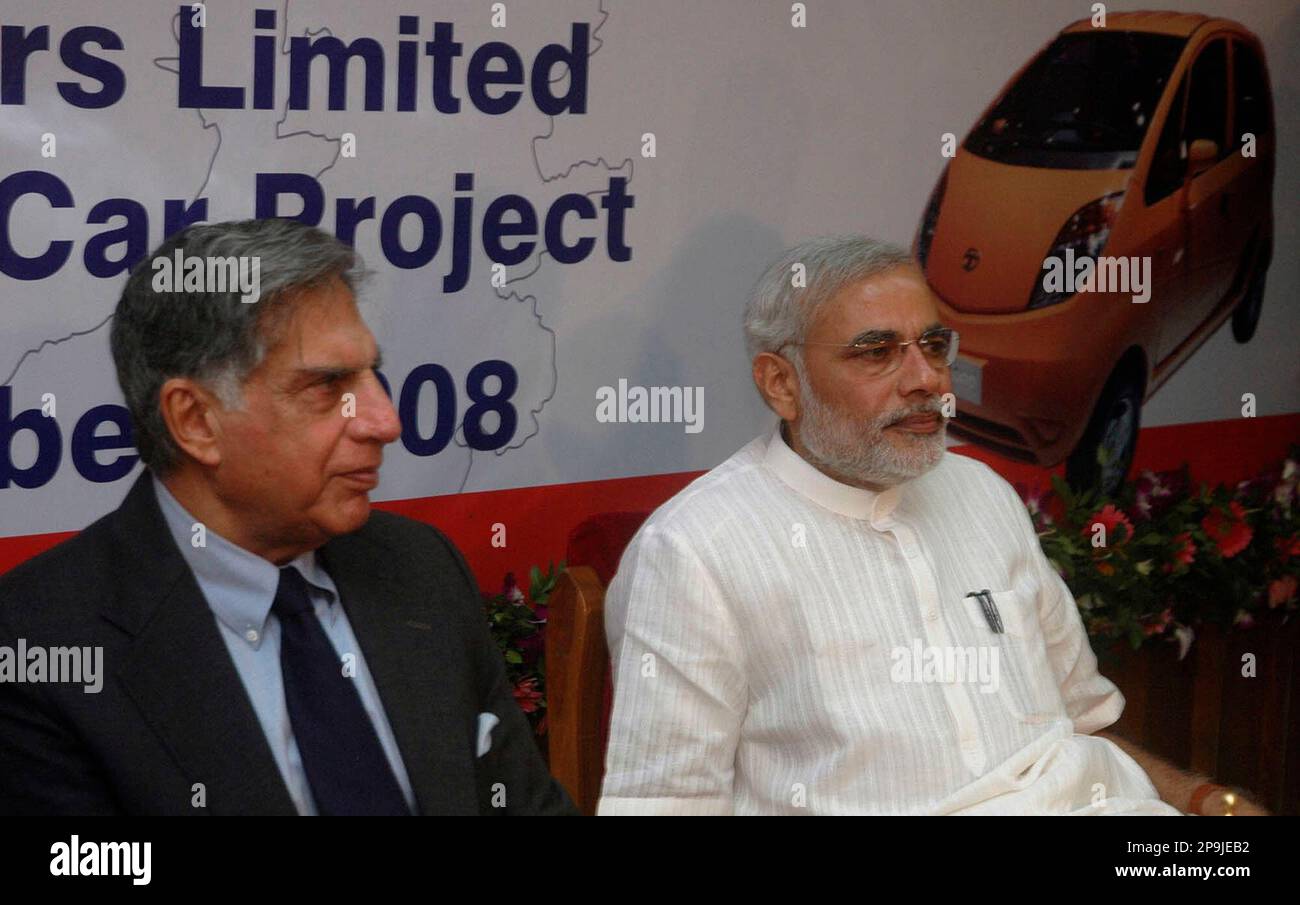 Gujarat state Chief Minister Narendra Modi, right, and Tata Group ...