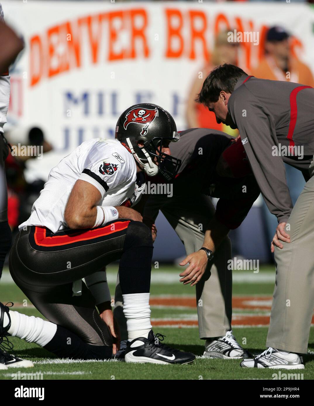 Tampa Bay Buccaneers quarterback Brian Griese is looked after by ...