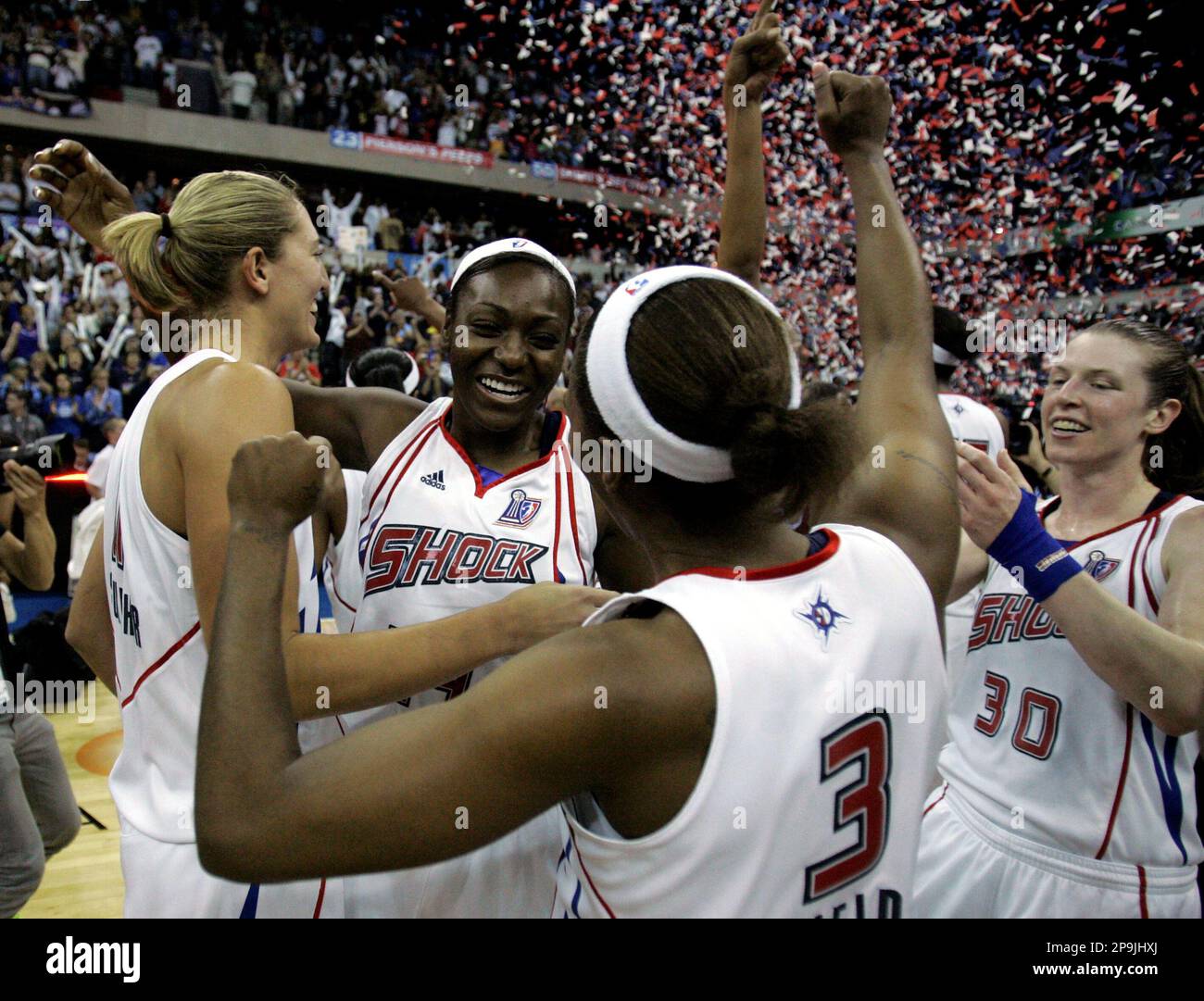 From left to right, Detroit Shock center Kelly Schumacher, center ...