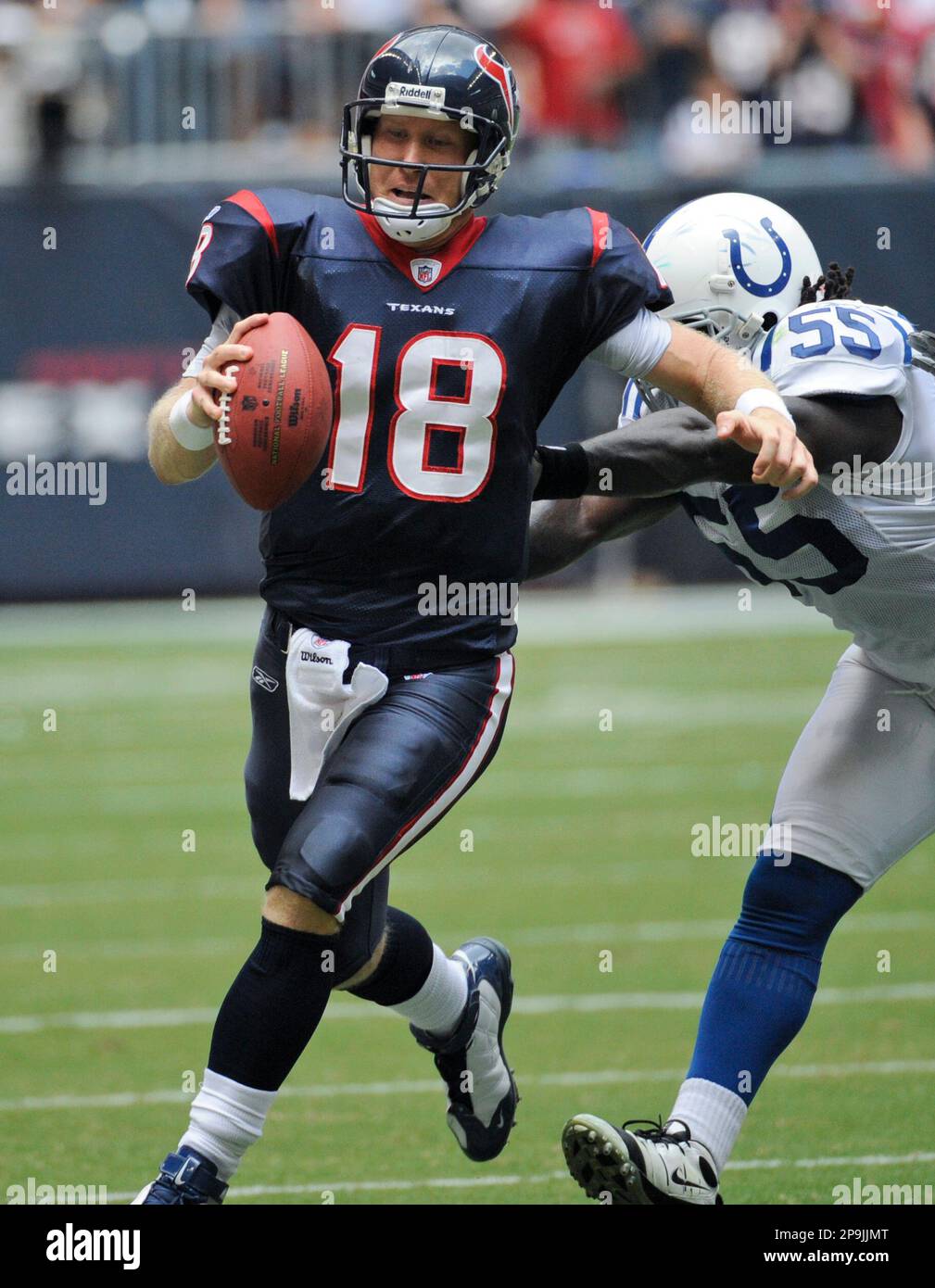 Houston Texans quarterback Sage Rosenfels (18) is pushed out of bounds ...